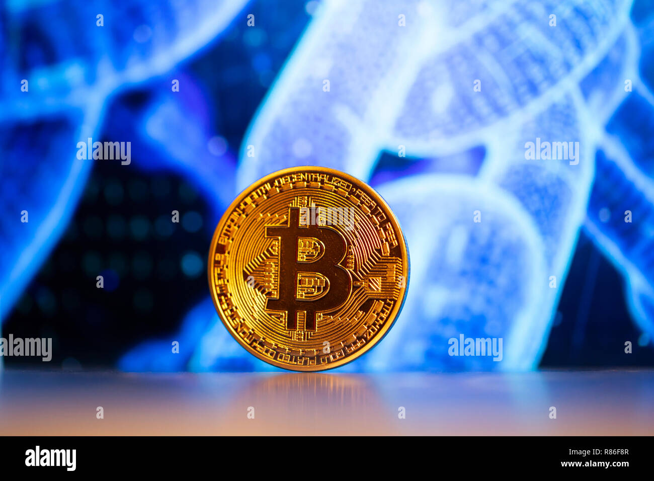 bitcoin on blue chart background - cryptocurrency concept Stock Photo ...