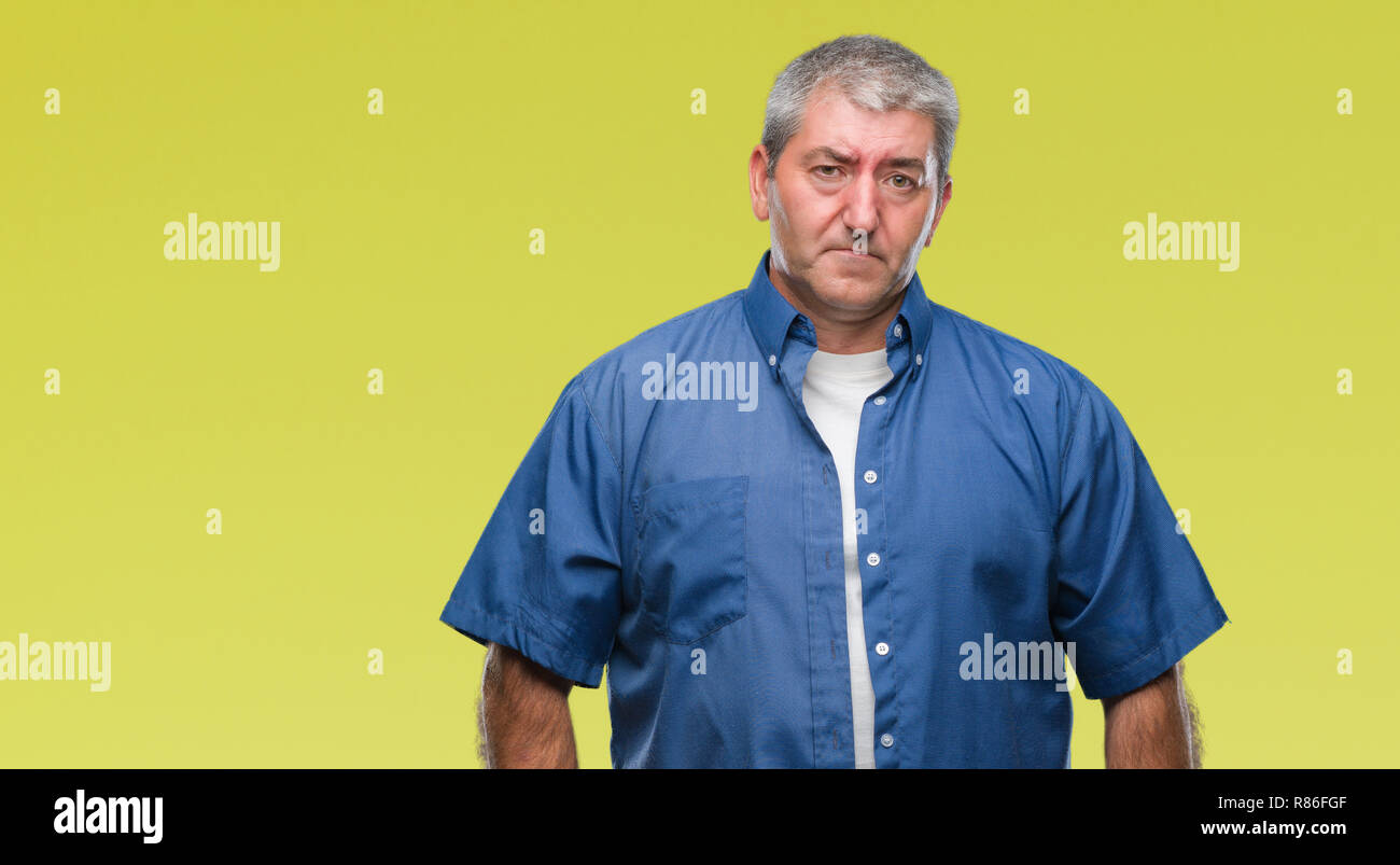 Handsome senior man over isolated background depressed and worry for ...