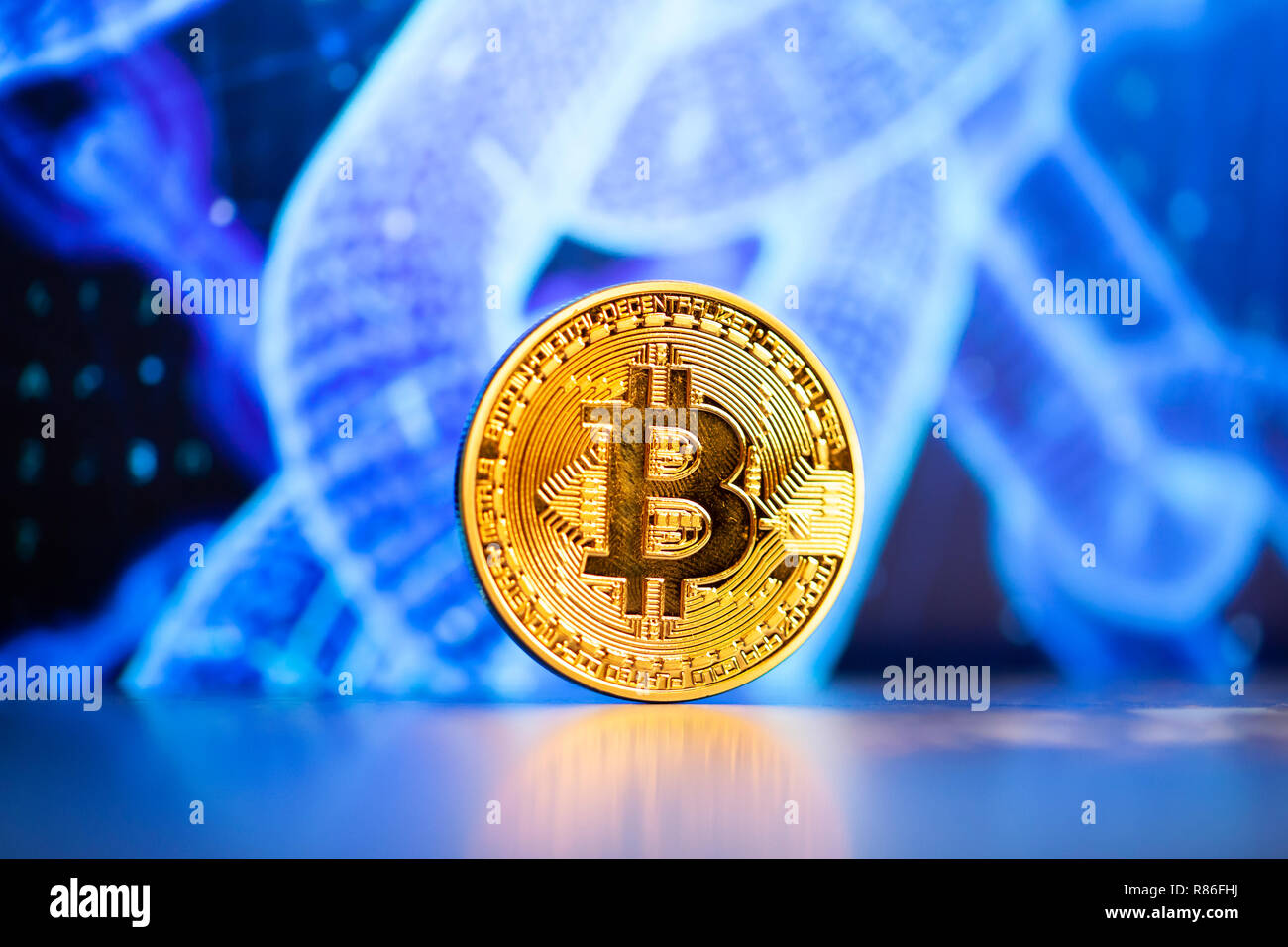 bitcoin on blue chart background - cryptocurrency concept Stock Photo ...