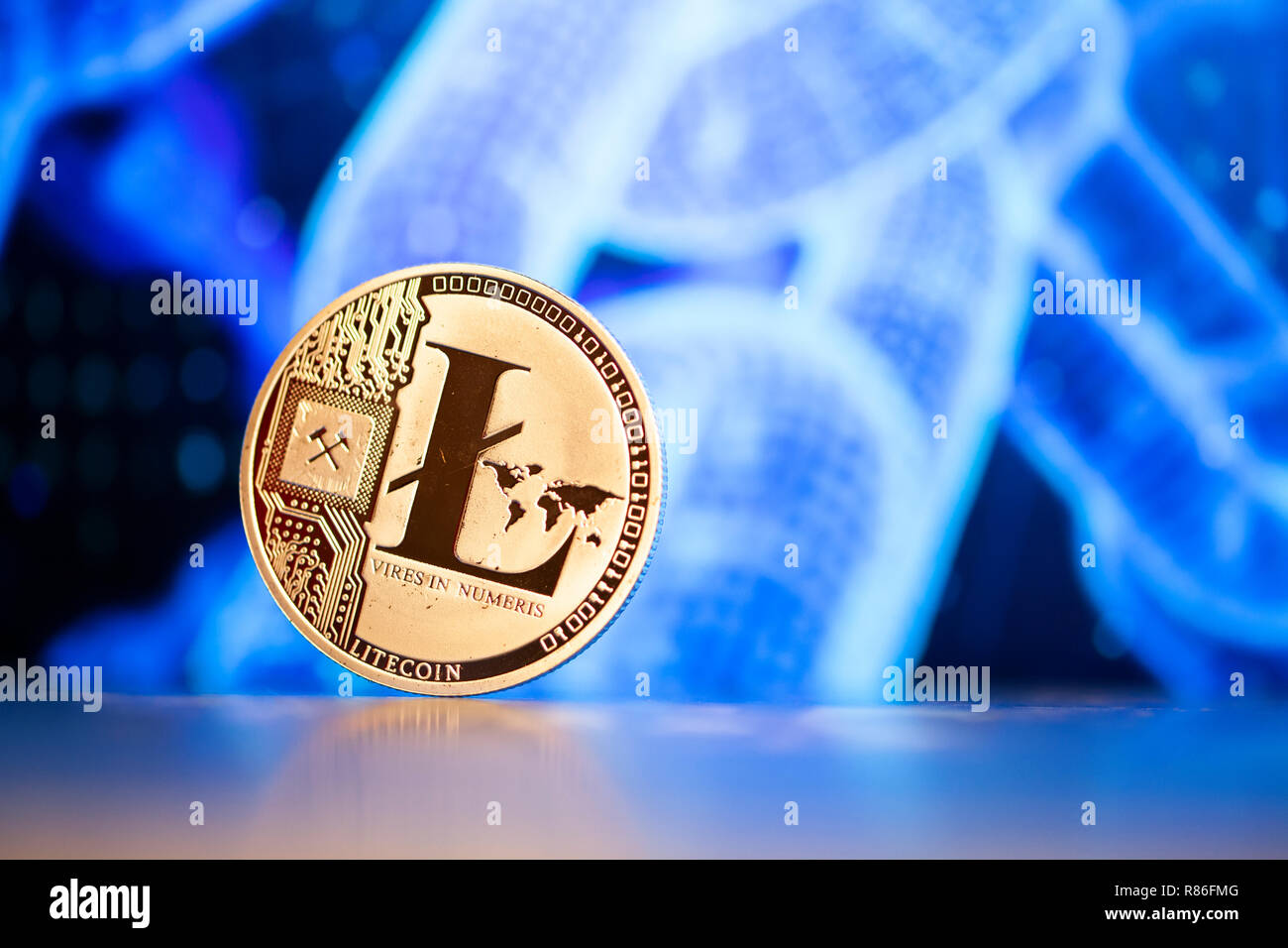 litecoin on blue chart background cryptocurrency concept Stock Photo ...