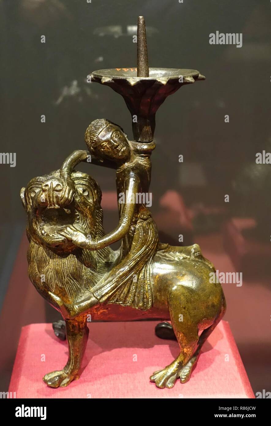 Candlestick of Samson with lion, probably Dinant, 1200-150 AD, gilt ...