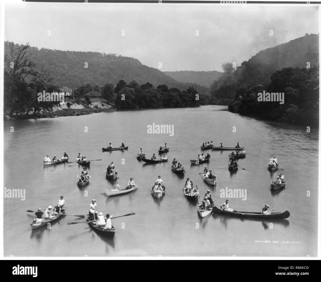 Canoers on the lake Stock Photo - Alamy