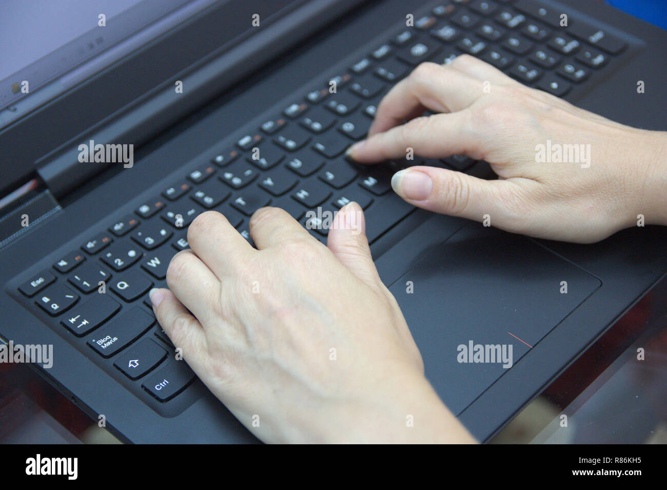 Someone Closing Their Laptop