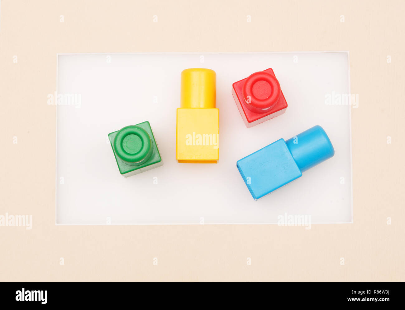 Plastic building blocks in the frame Stock Photo - Alamy