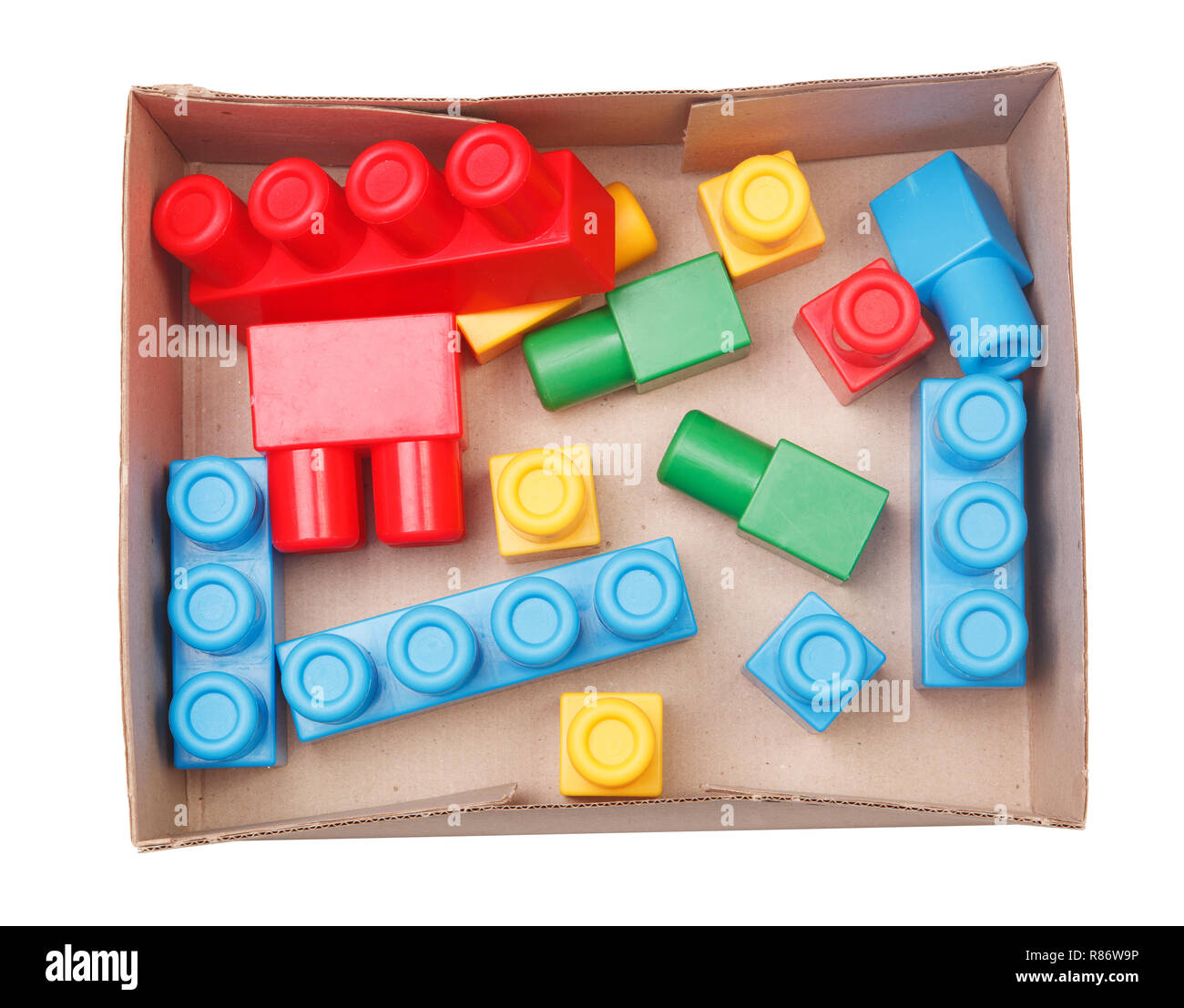 Plastic building blocks in the box isolated on white Stock Photo - Alamy