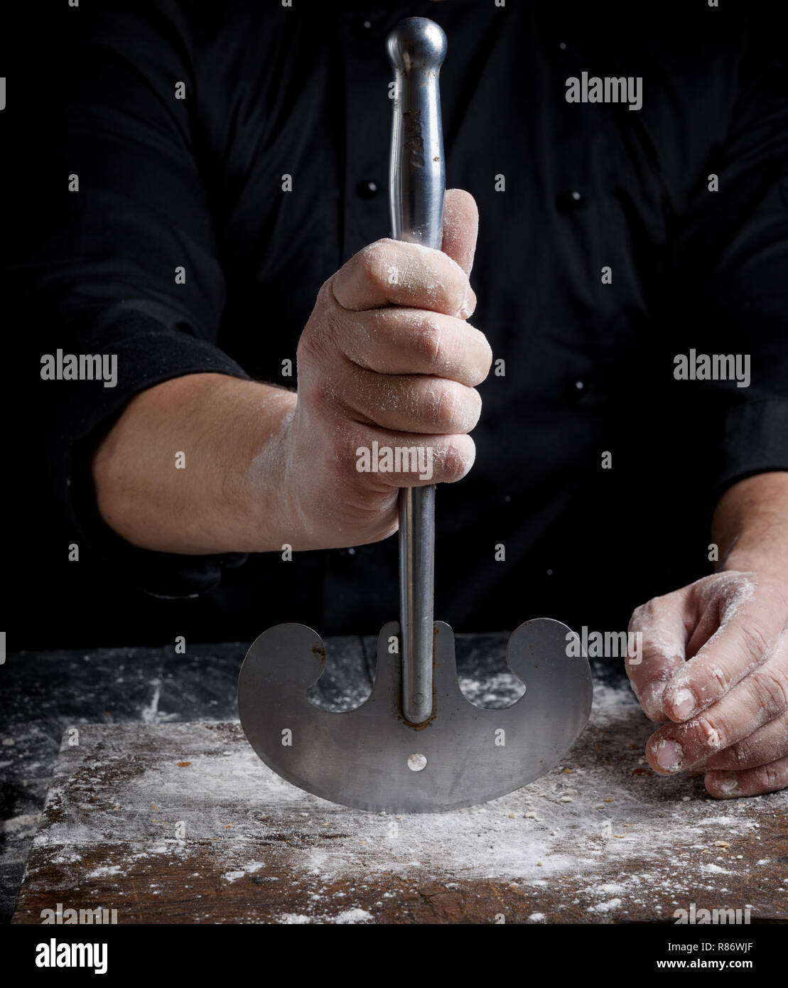right male hand is holding an old metal kitchen knife, close up Stock ...