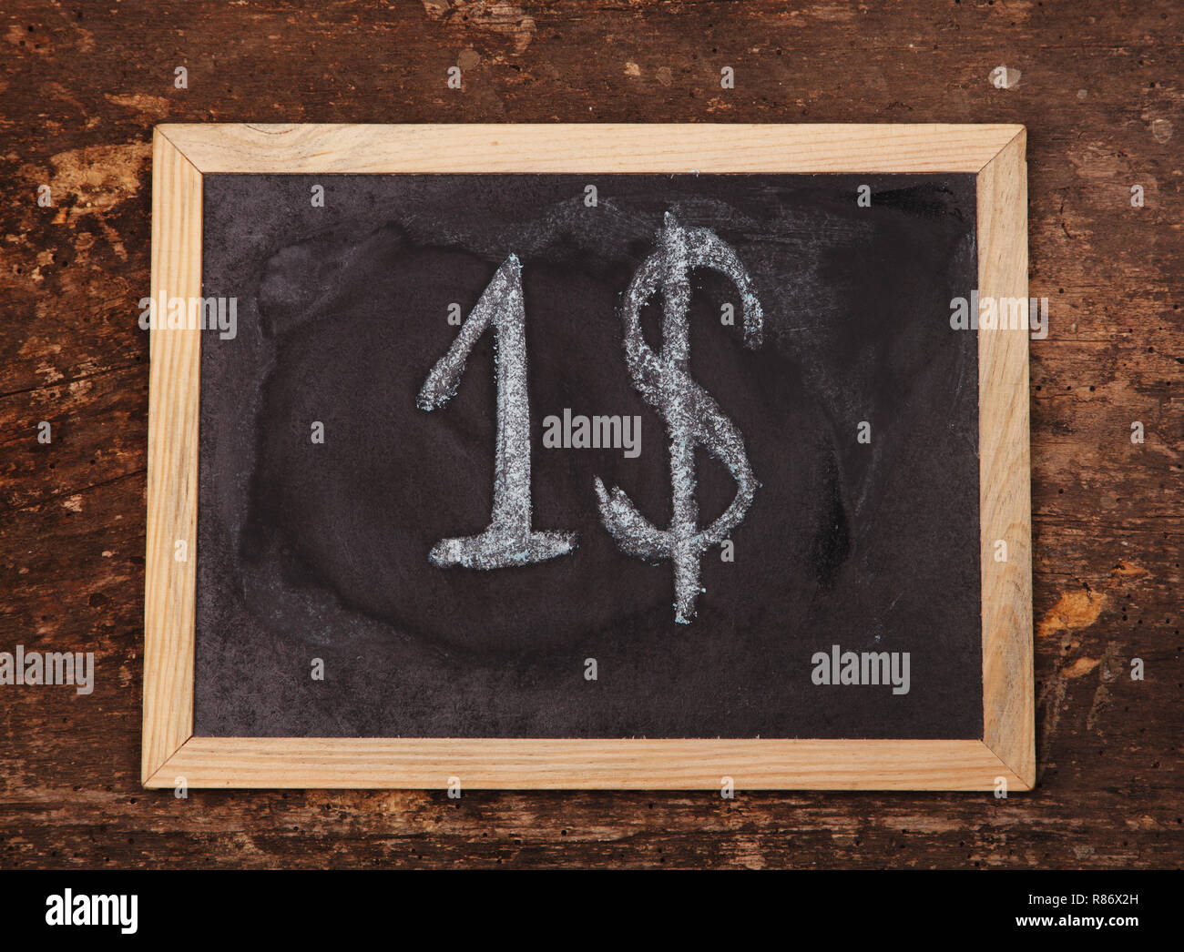 chalk handwritten dollar sign on blackboard Stock Photo - Alamy