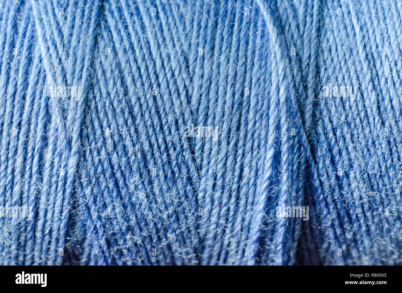 blue thread as a background Stock Photo - Alamy