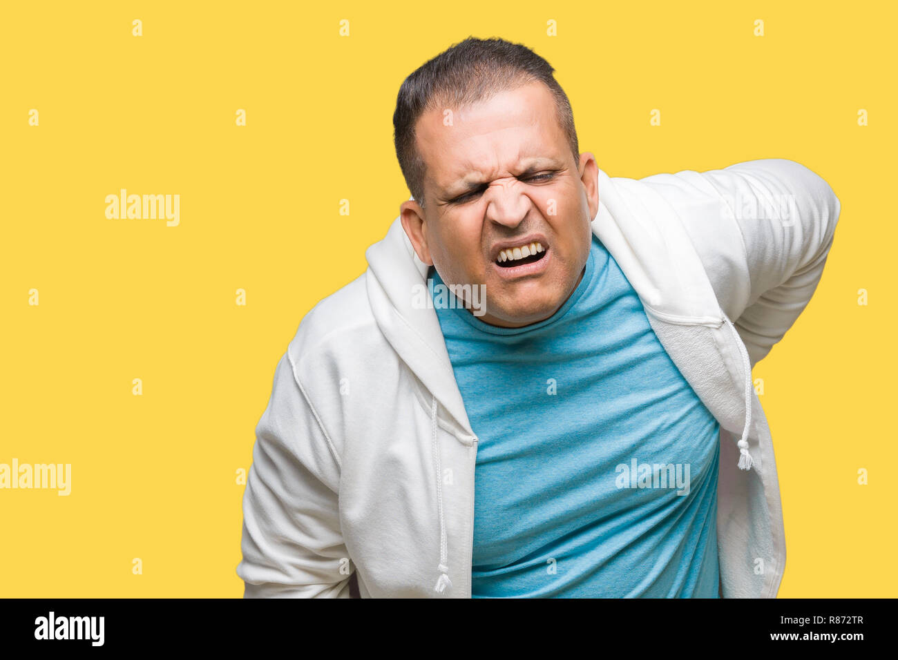 Middle age arab man wearing sweatshirt over isolated background ...