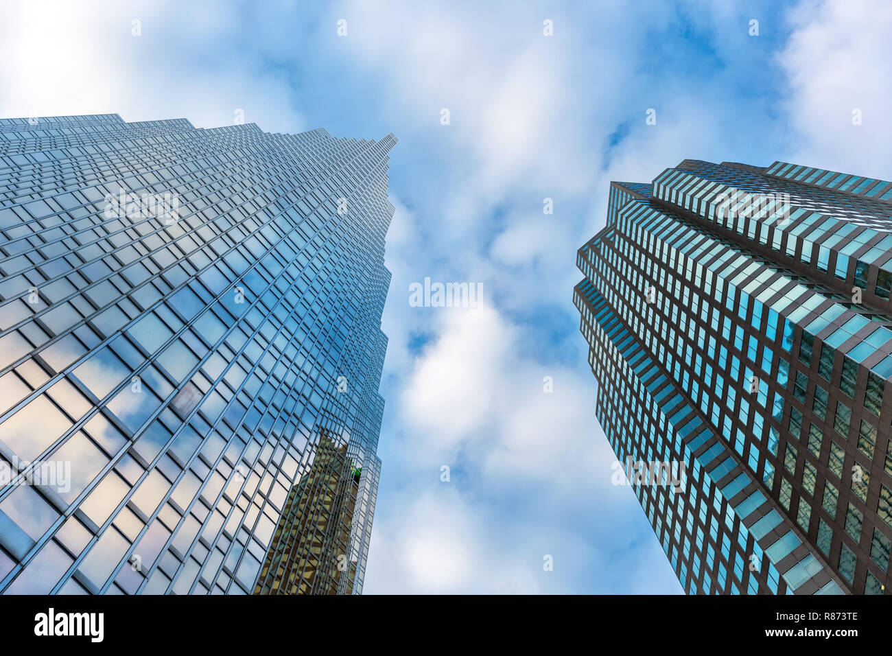 A business building seen from below in Toronto in Canada in a blue sky ...