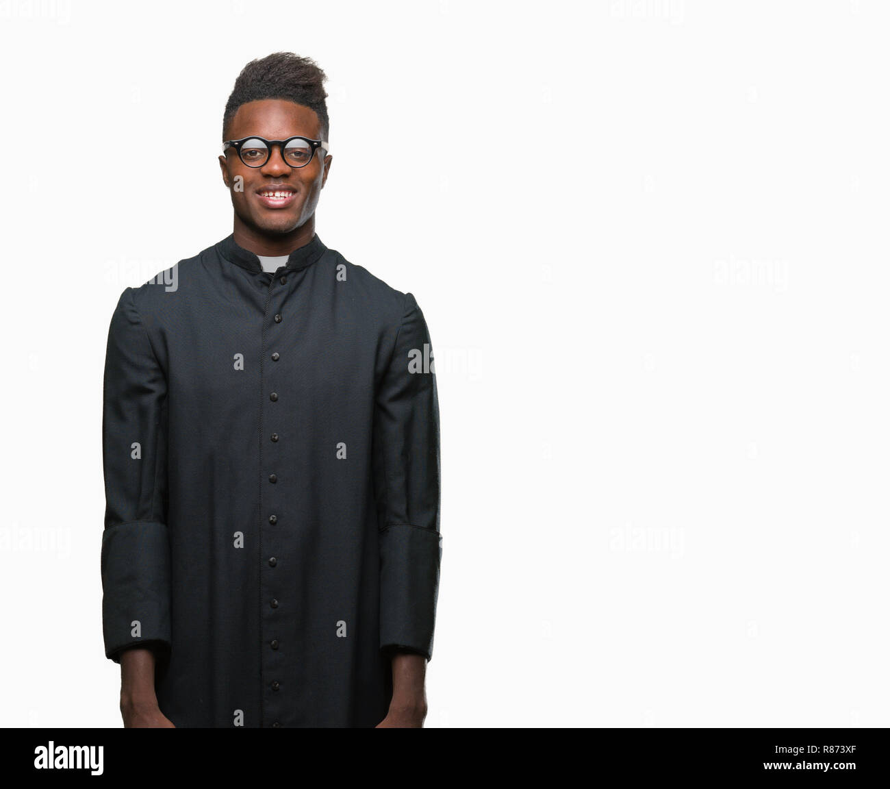 Young african american priest man over isolated background with a happy ...