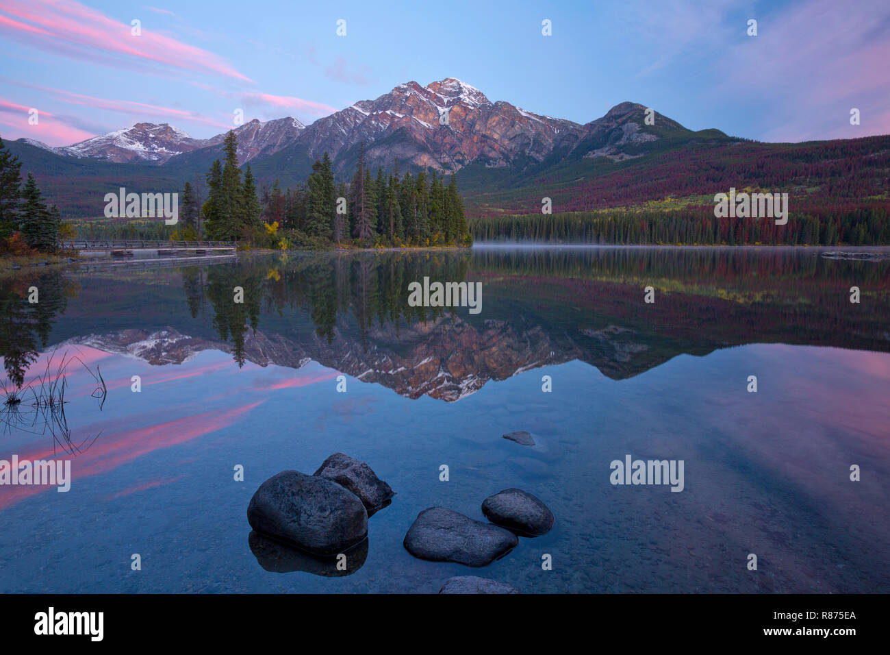 The reflection of Pyramid Mountain in Pyramid Lake in Jasper National ...