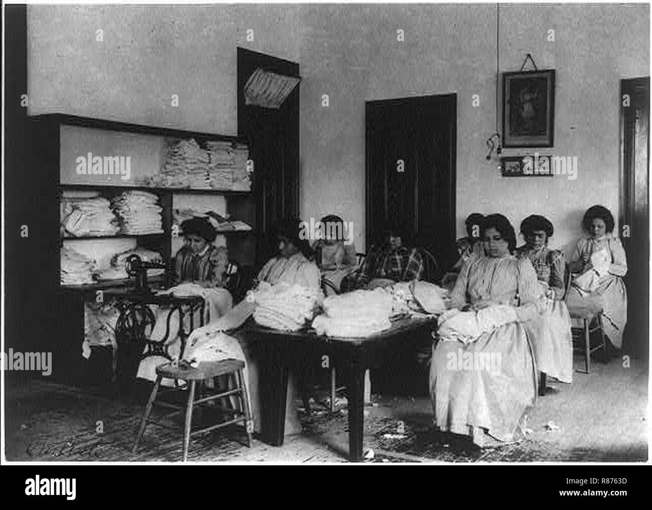 Clothes mending Black and White Stock Photos & Images - Alamy