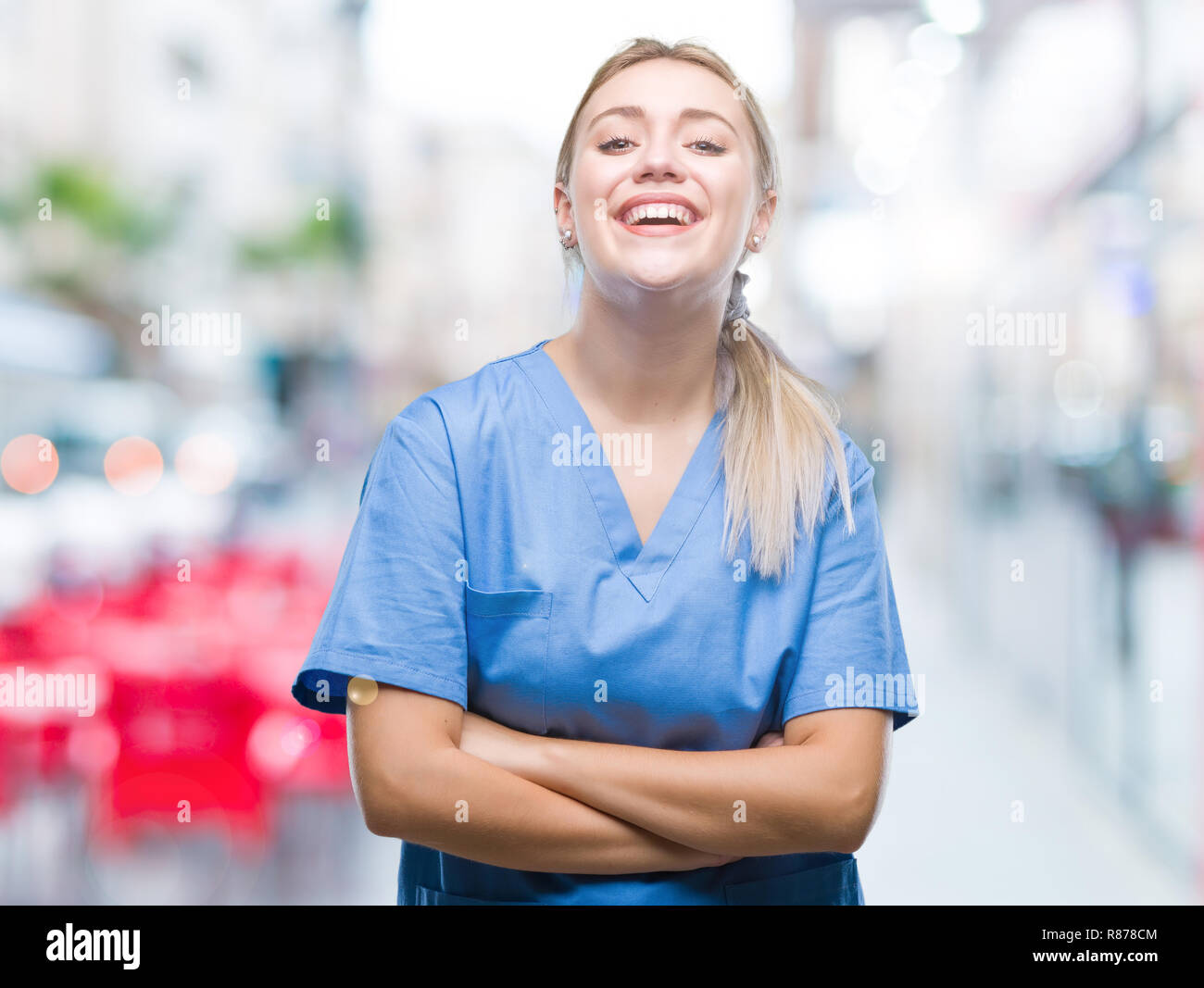 Young blonde surgeon doctor woman wearing medical uniform over isolated ...