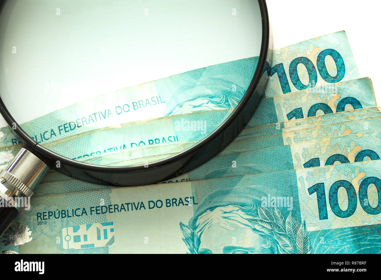 Brazilian money under the microscope Stock Photo - Alamy