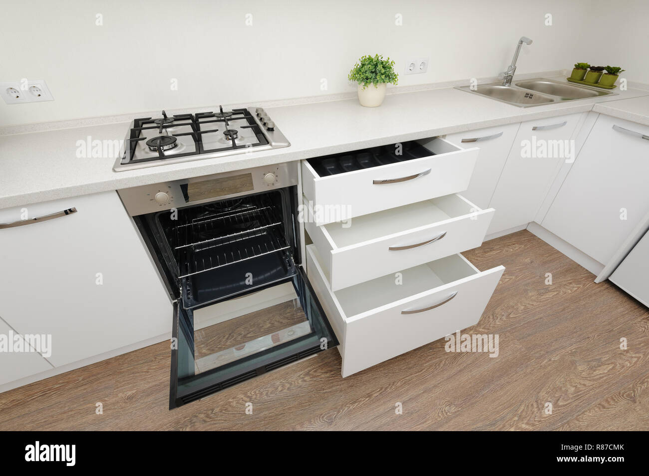 Modern white kitchen interior Stock Photo - Alamy