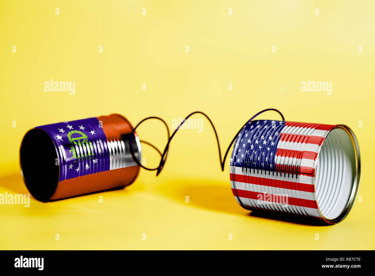 tin can phone with USA and Georgia U.S. state Flags.communication ...