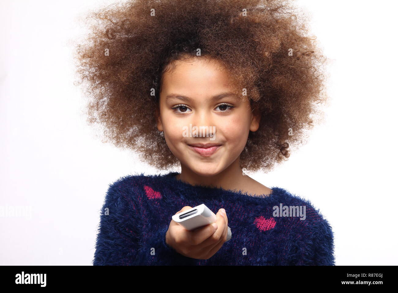 Beautiful little afro girl in front of a background Stock Photo - Alamy