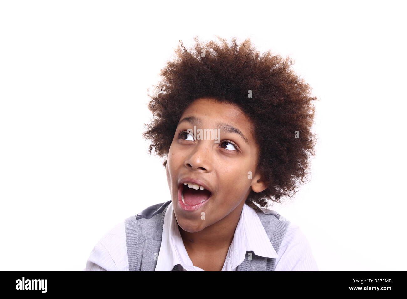 Beautiful afro boy in front of a background Stock Photo - Alamy
