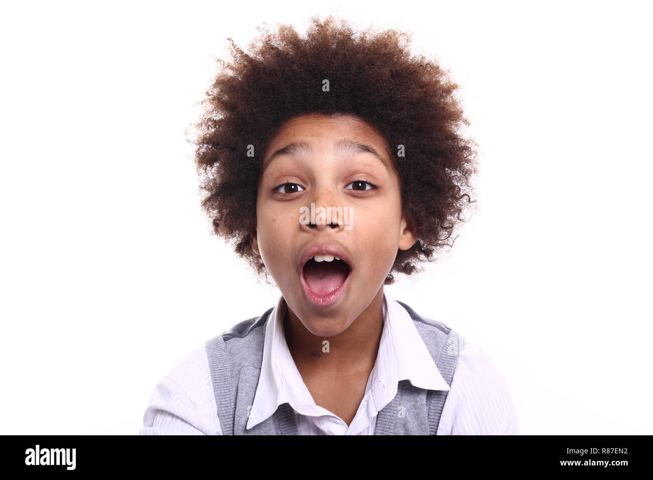 Beautiful afro boy in front of a background Stock Photo - Alamy