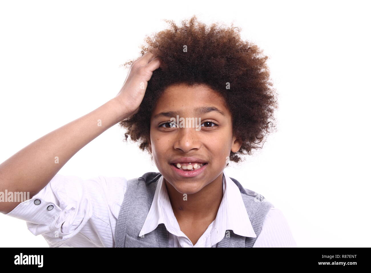 Beautiful afro boy in front of a background Stock Photo - Alamy