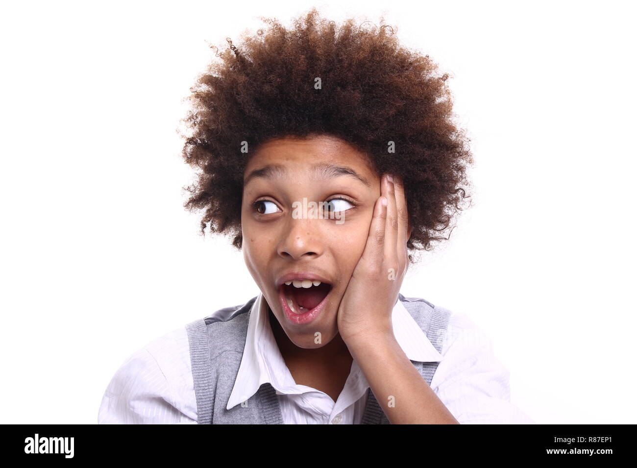 Beautiful afro boy in front of a background Stock Photo - Alamy