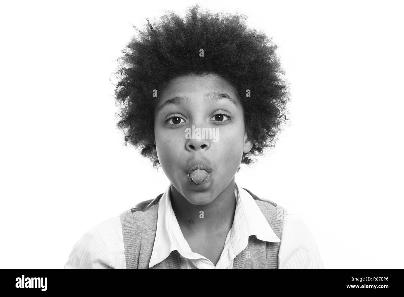 Beautiful afro boy in front of a background Stock Photo - Alamy