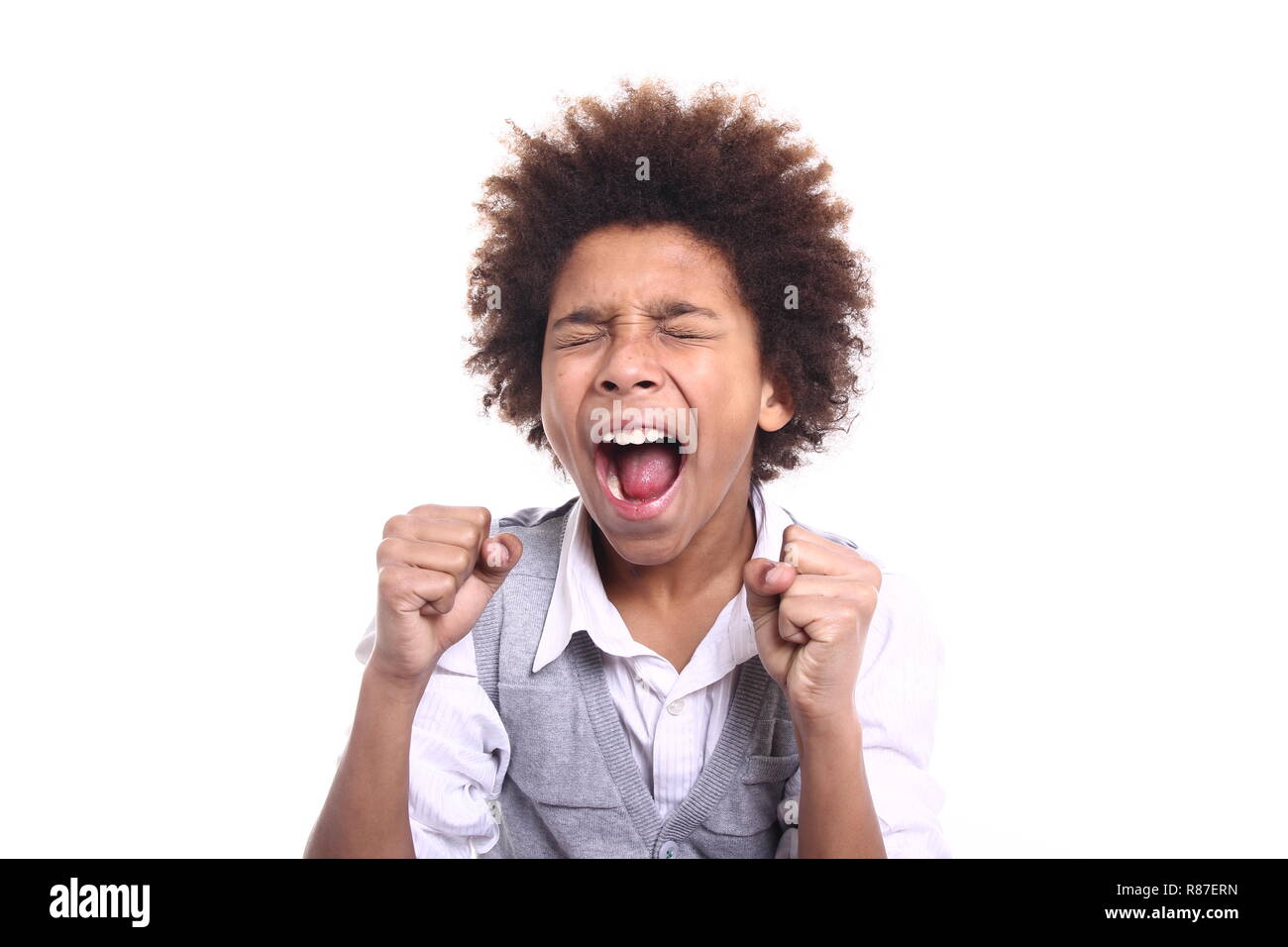 Beautiful afro boy in front of a background Stock Photo - Alamy