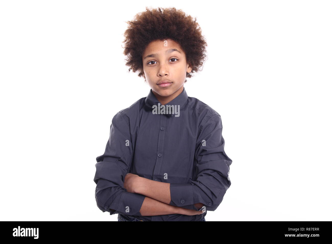 Beautiful afro boy in front of a background Stock Photo - Alamy