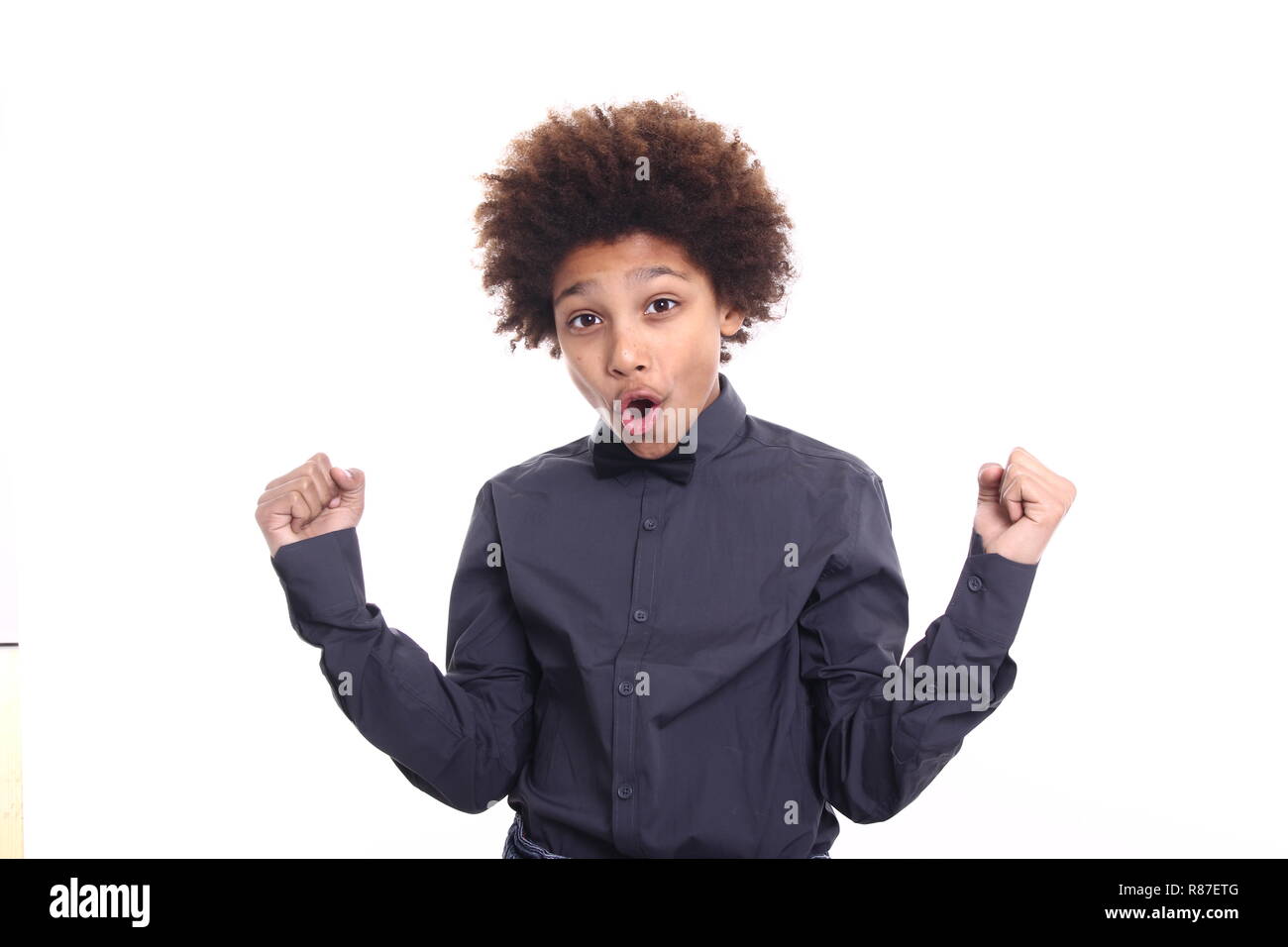 Beautiful afro boy in front of a background Stock Photo - Alamy