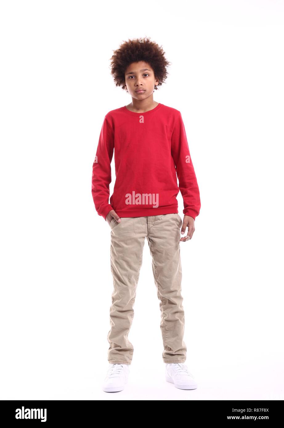 Beautiful afro boy in front of a background Stock Photo - Alamy