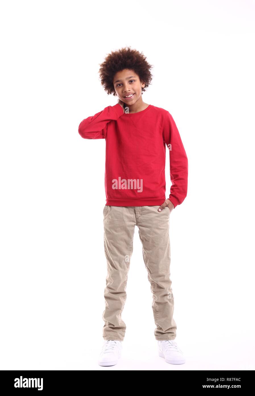 Beautiful afro boy in front of a background Stock Photo - Alamy