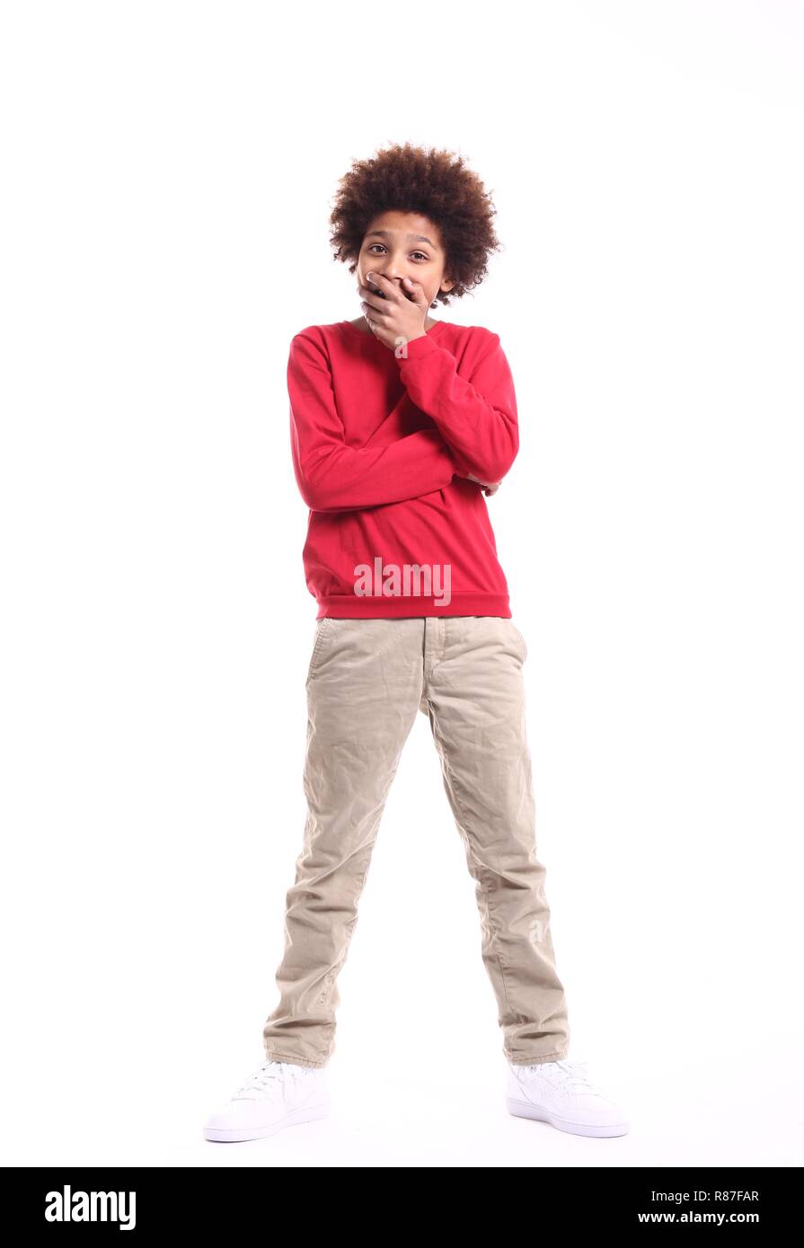 Beautiful afro boy in front of a background Stock Photo - Alamy