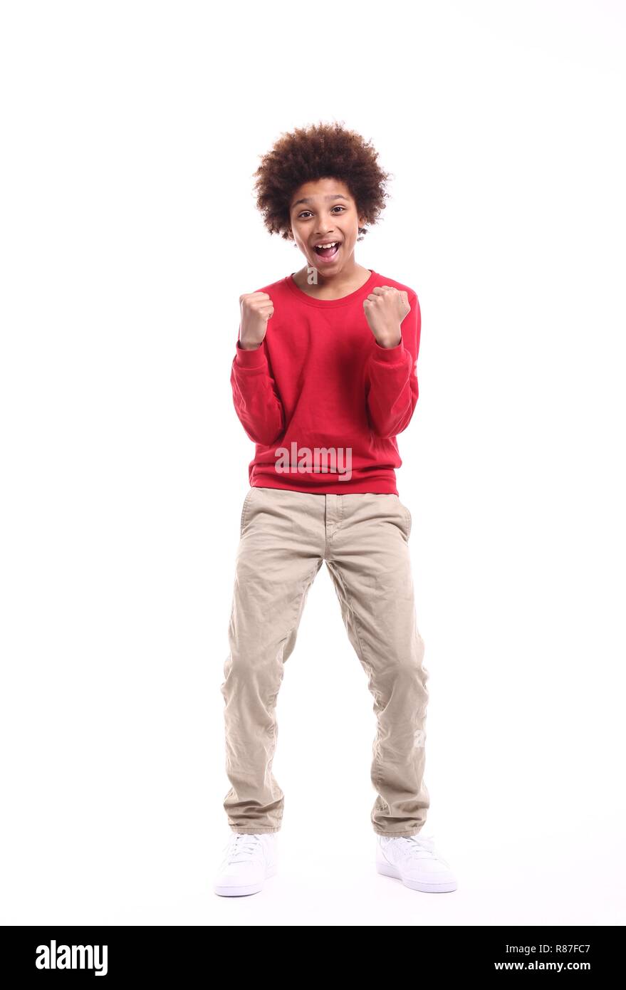 Beautiful afro boy in front of a background Stock Photo - Alamy