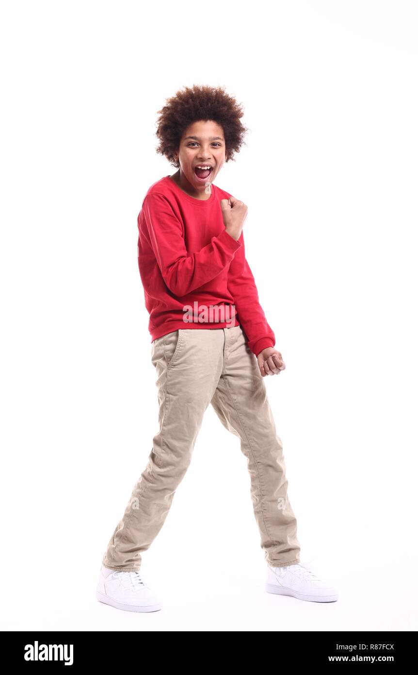Beautiful afro boy in front of a background Stock Photo - Alamy