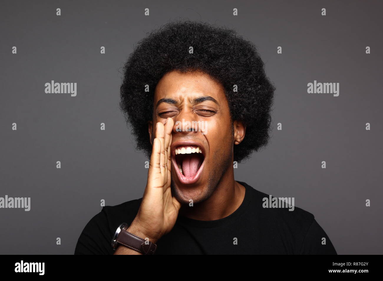 Beautiful man in front of a white background Stock Photo - Alamy