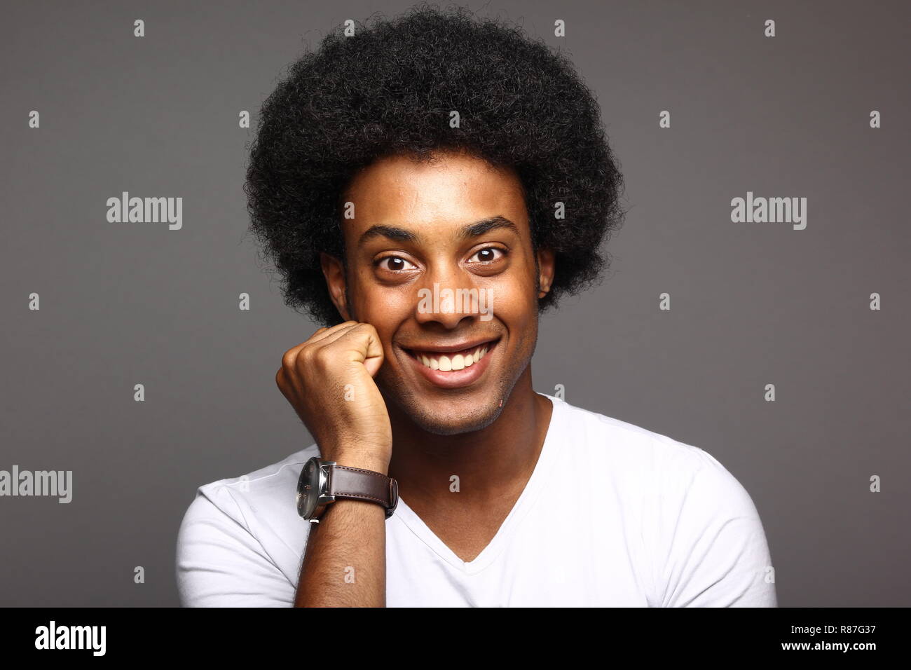 Beautiful man in front of a white background Stock Photo - Alamy