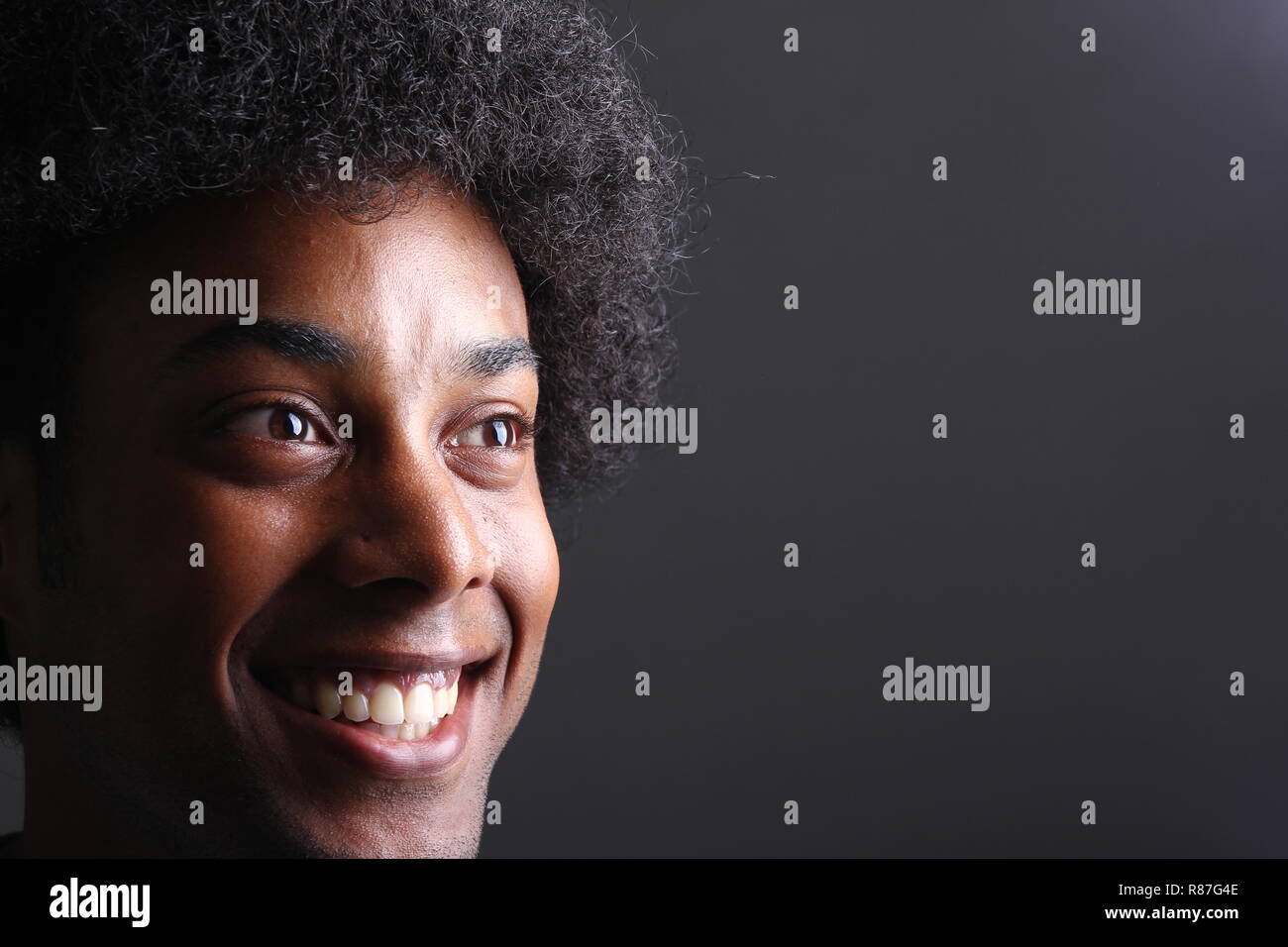 Beautiful man in front of a white background Stock Photo - Alamy