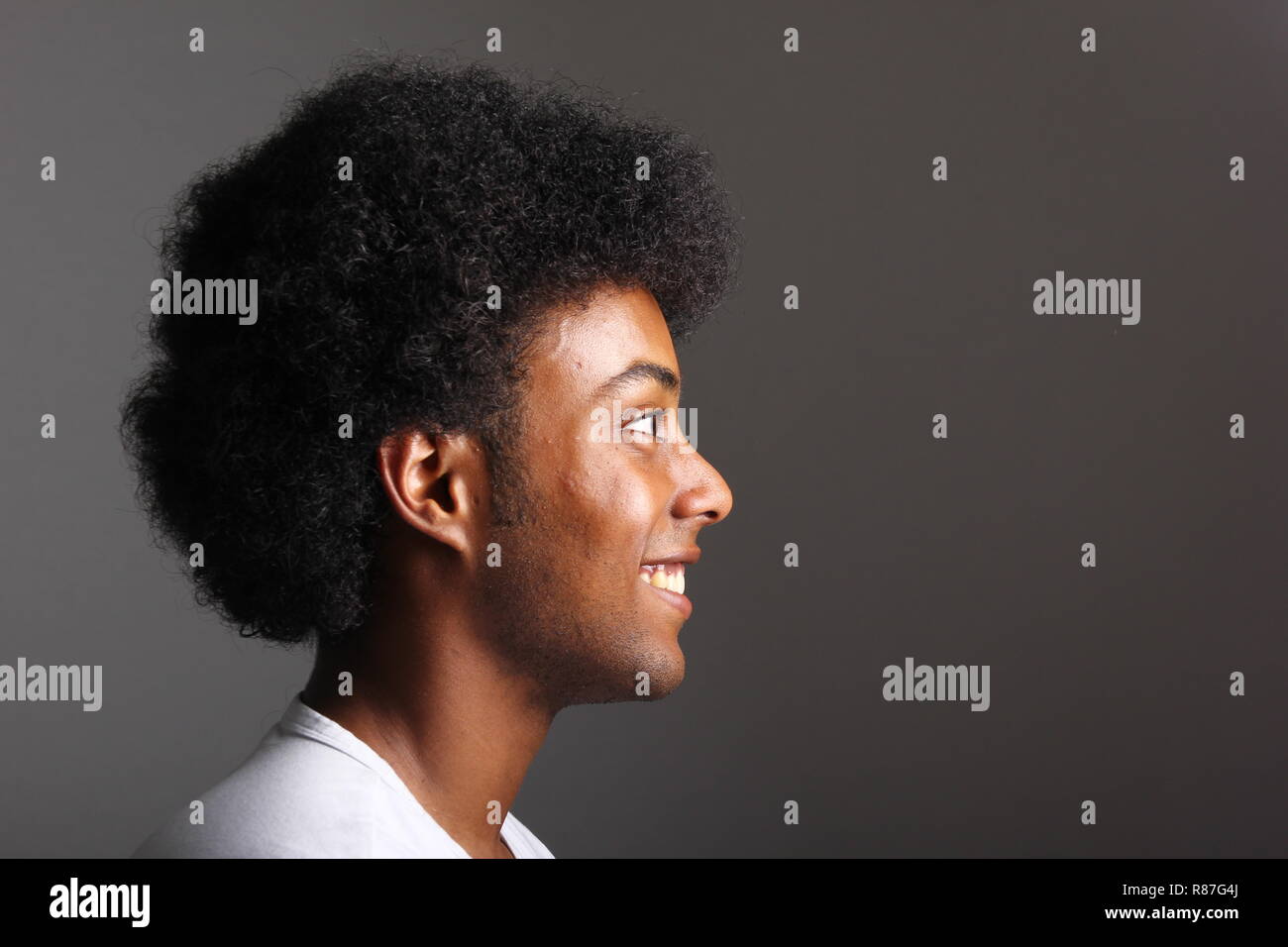 Beautiful man in front of a white background Stock Photo - Alamy