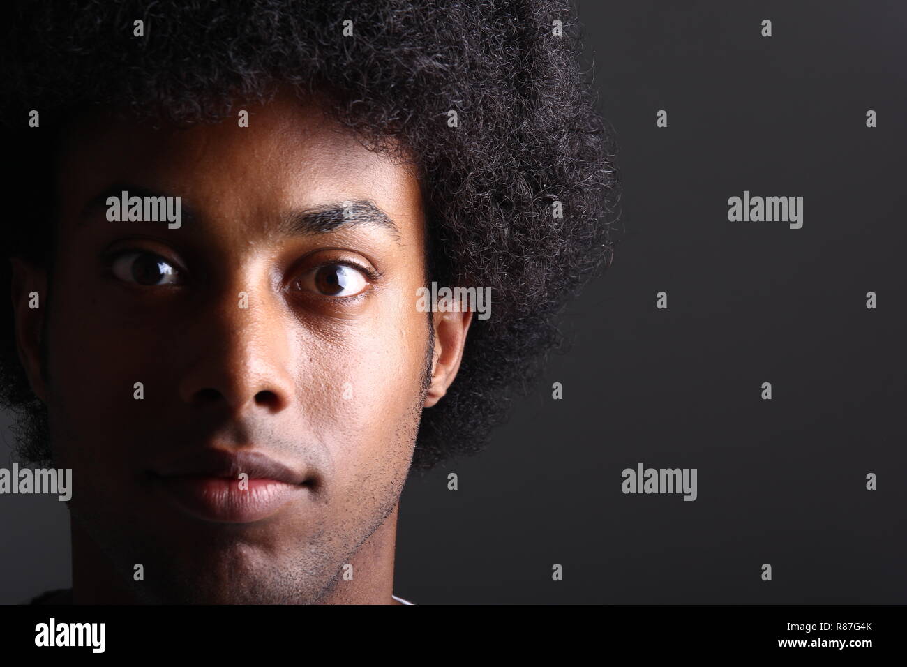 Beautiful man in front of a white background Stock Photo - Alamy