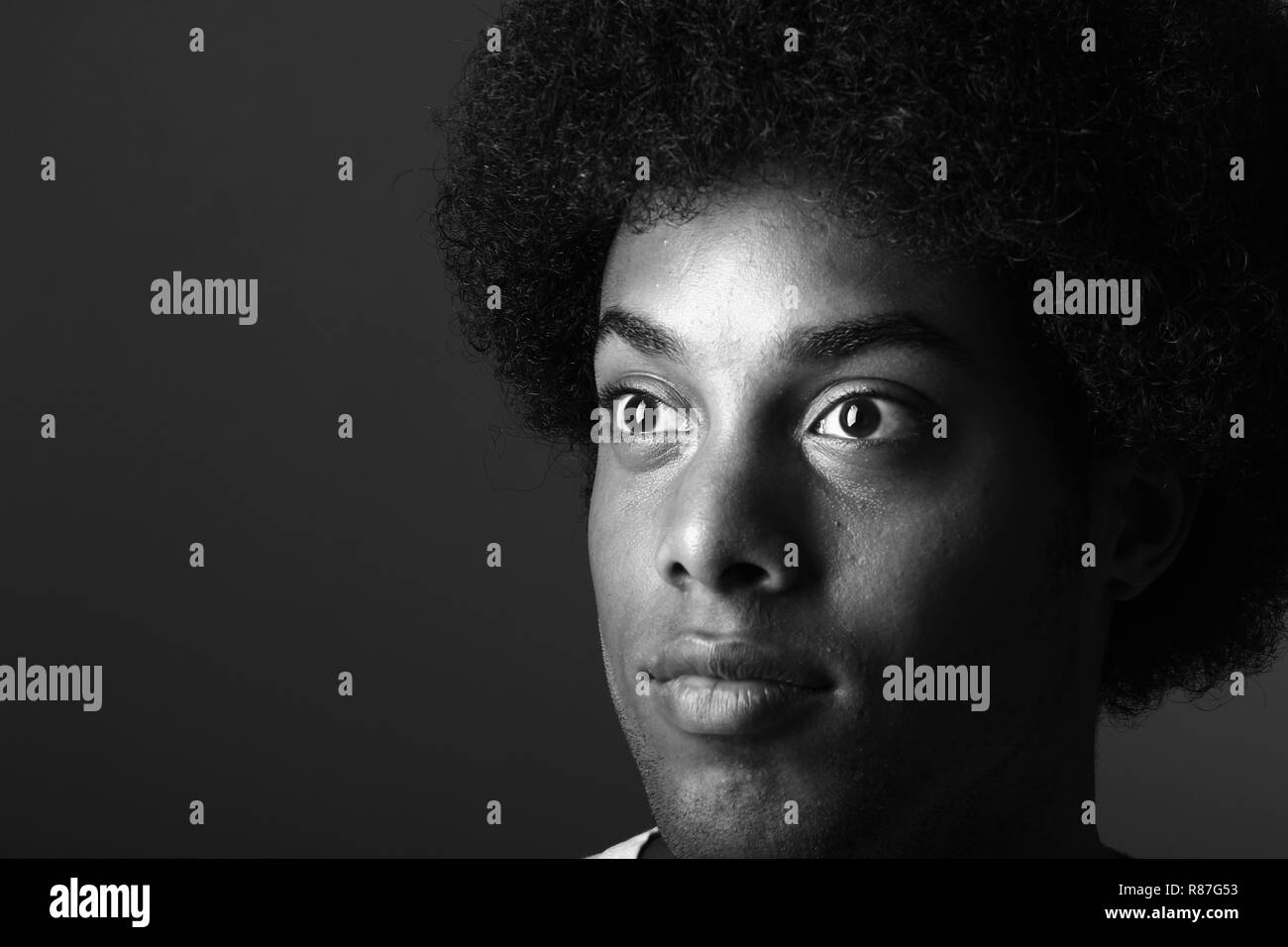 Beautiful man in front of a white background Stock Photo - Alamy
