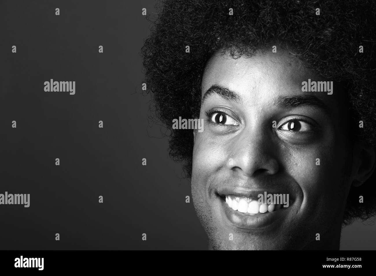 Beautiful man in front of a white background Stock Photo - Alamy