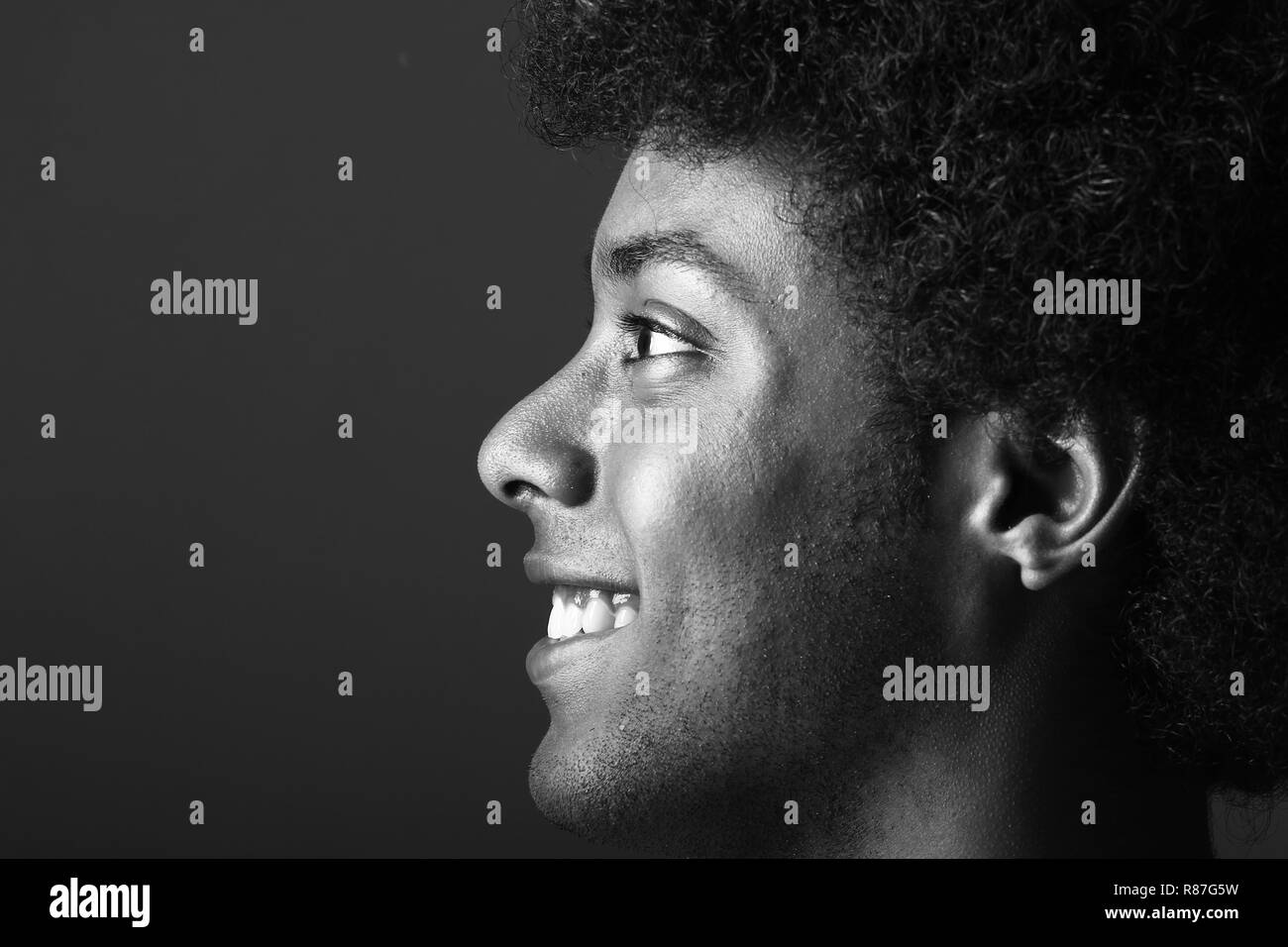 Beautiful man in front of a white background Stock Photo - Alamy