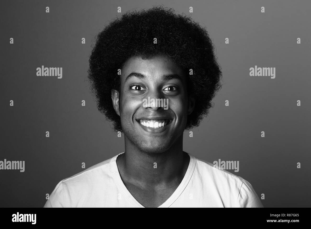 Beautiful man in front of a white background Stock Photo - Alamy