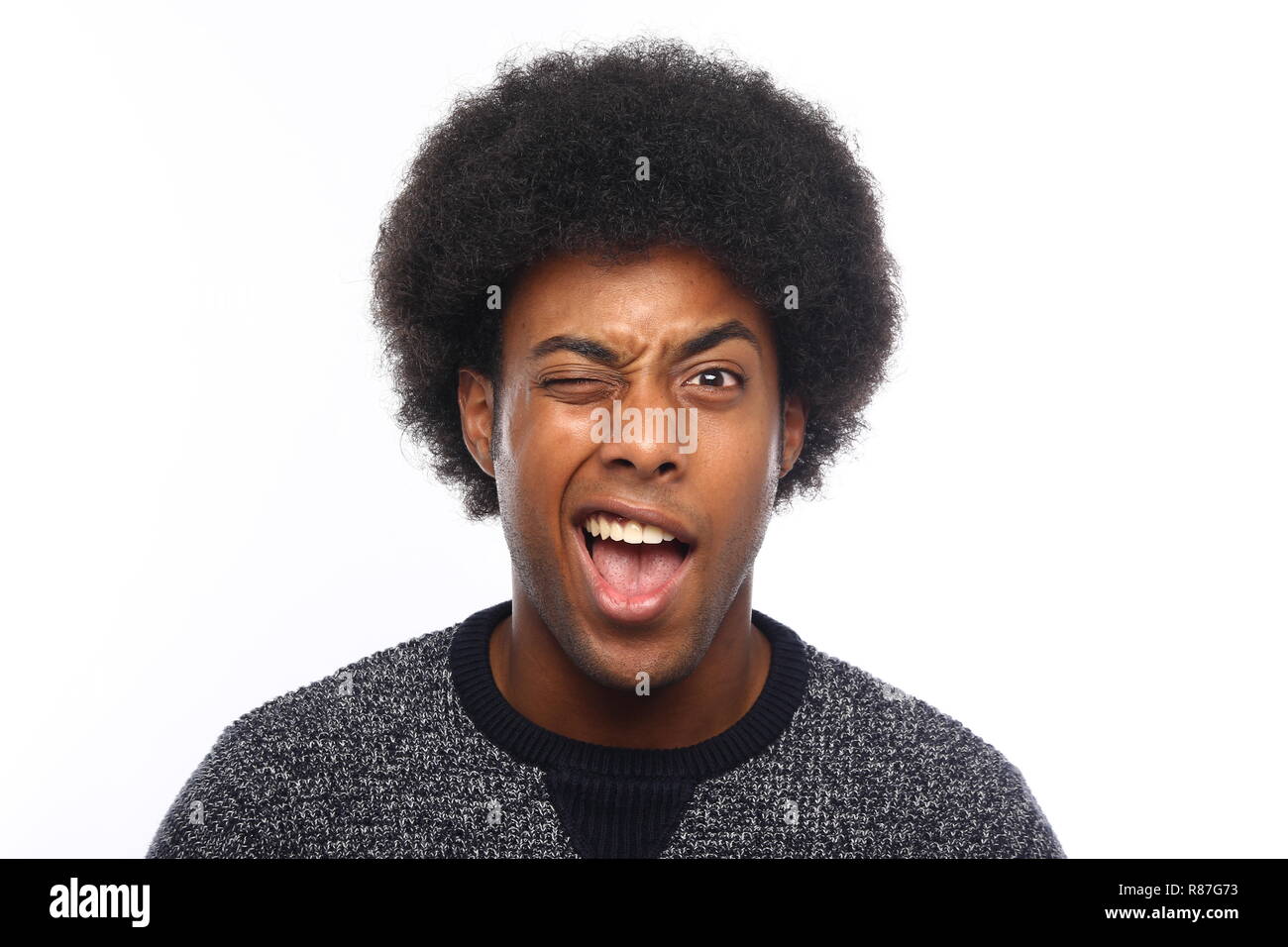 Beautiful man in front of a white background Stock Photo - Alamy