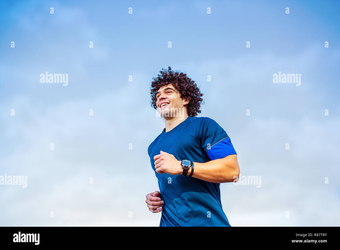 Fitness athlete runner man running. healthy lifestyle Stock Photo - Alamy