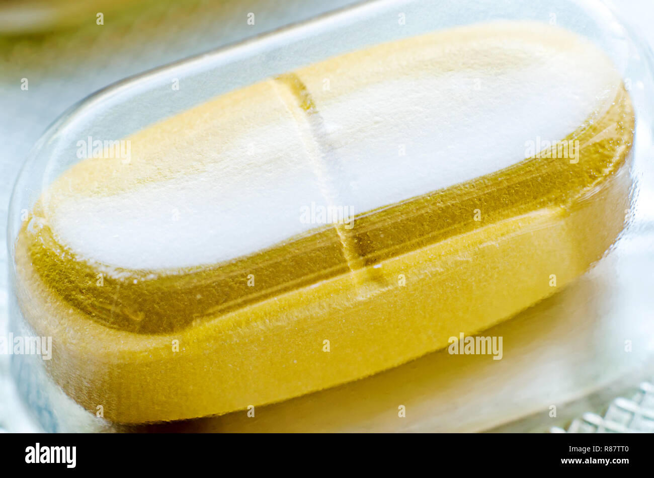 Big yellow pill hi-res stock photography and images - Alamy