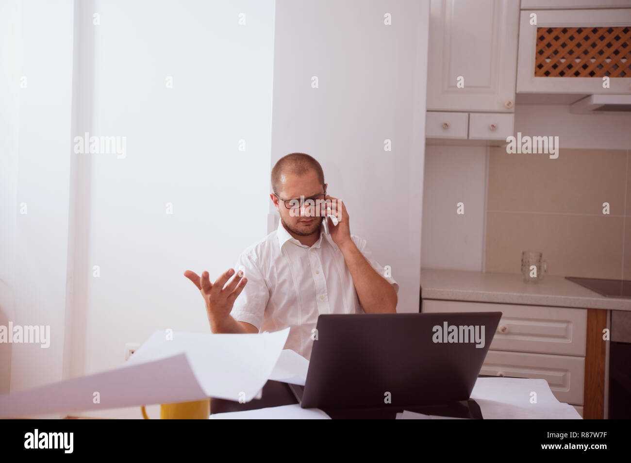 Angry businessman tablet laptop talking hi-res stock photography and ...