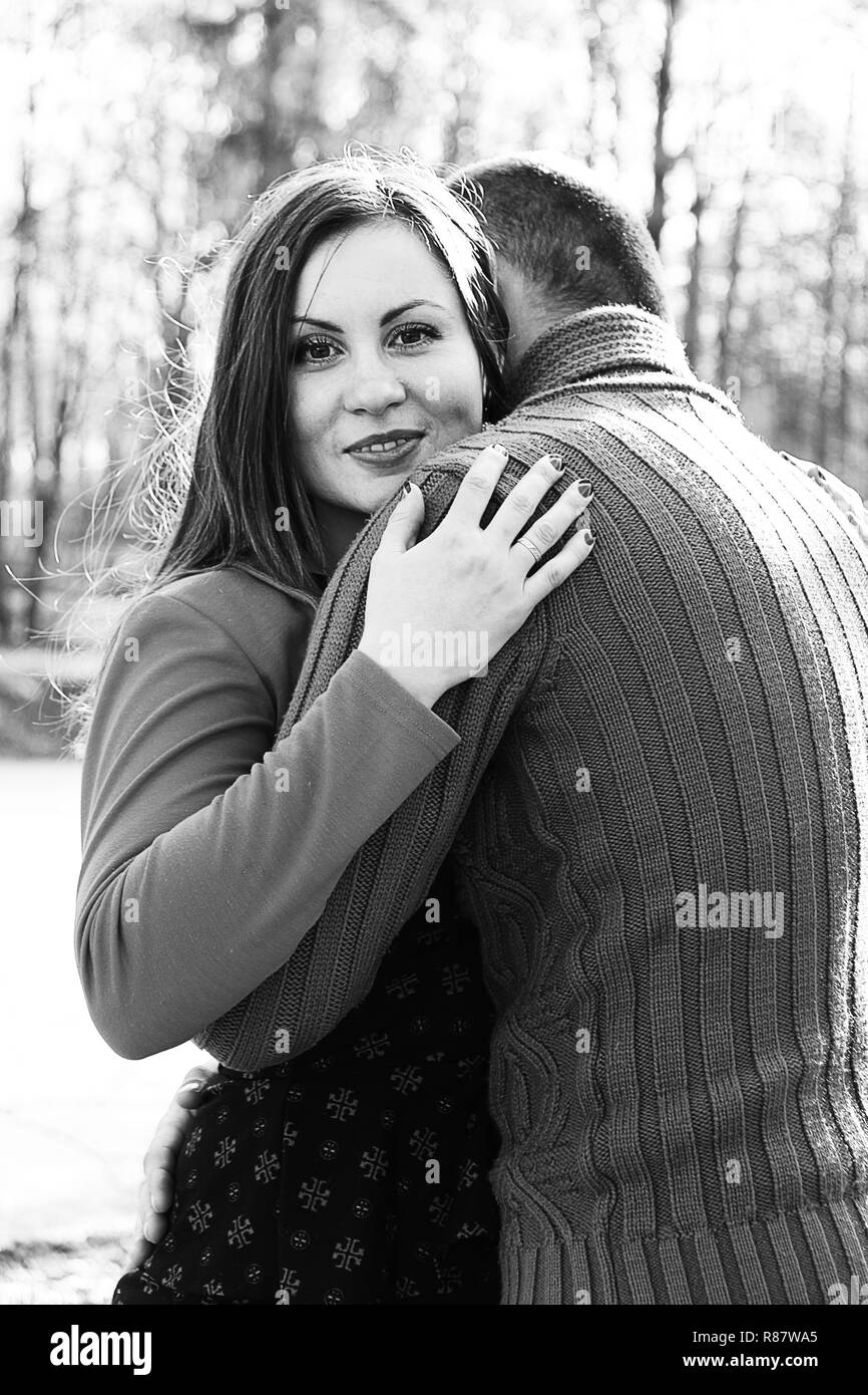 Happy woman hugs her husband on Valentine's day Stock Photo - Alamy