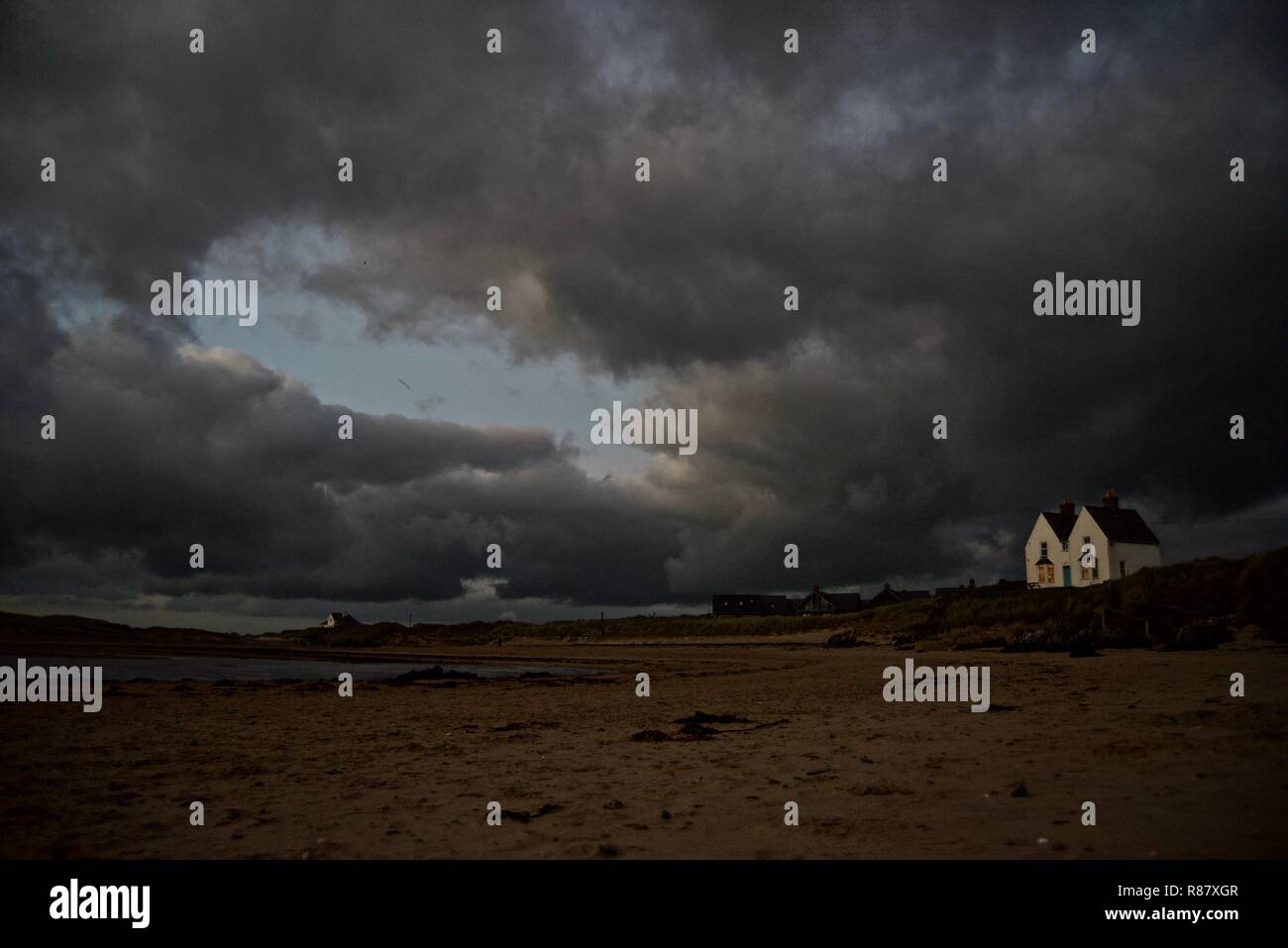 A beachfront victorian house at night in the seaside village of ...
